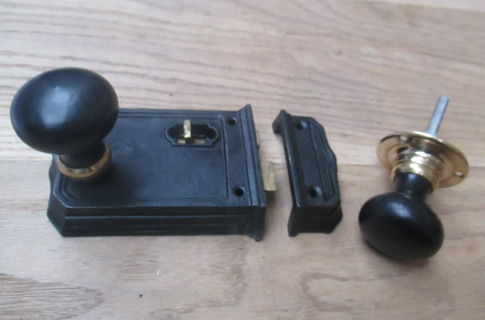 Shop Large Black Rim Latch and Plain Bun Ebony Brass Set | Ironmongery ...
