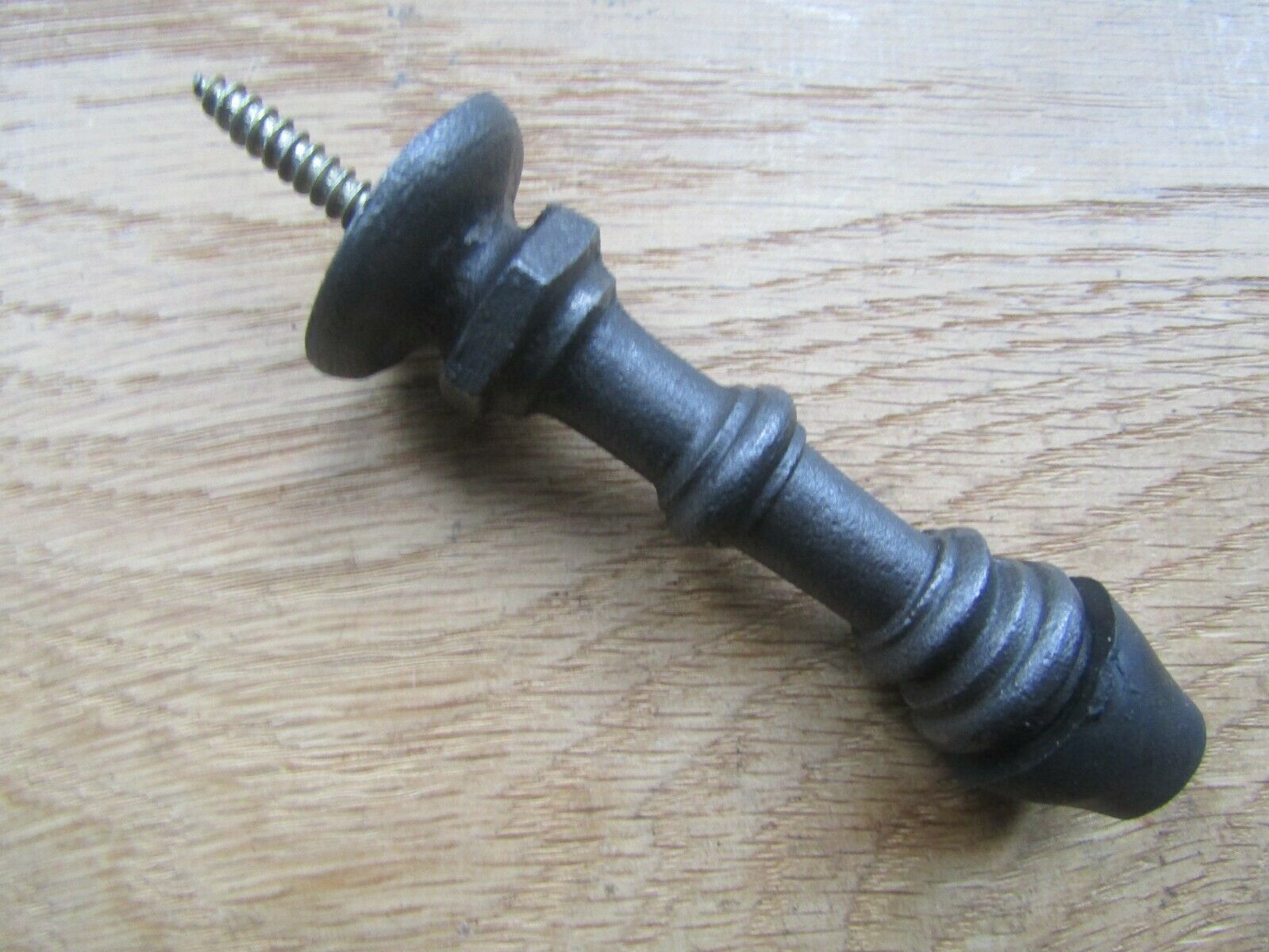 Cast Iron Screw In Door Stop Antique Iron | Ironmongery World