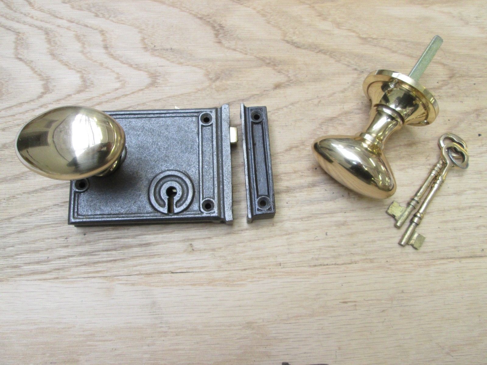 Horizontal Rim Lock Antique Iron & Oval Brass Set | Ironmongery World