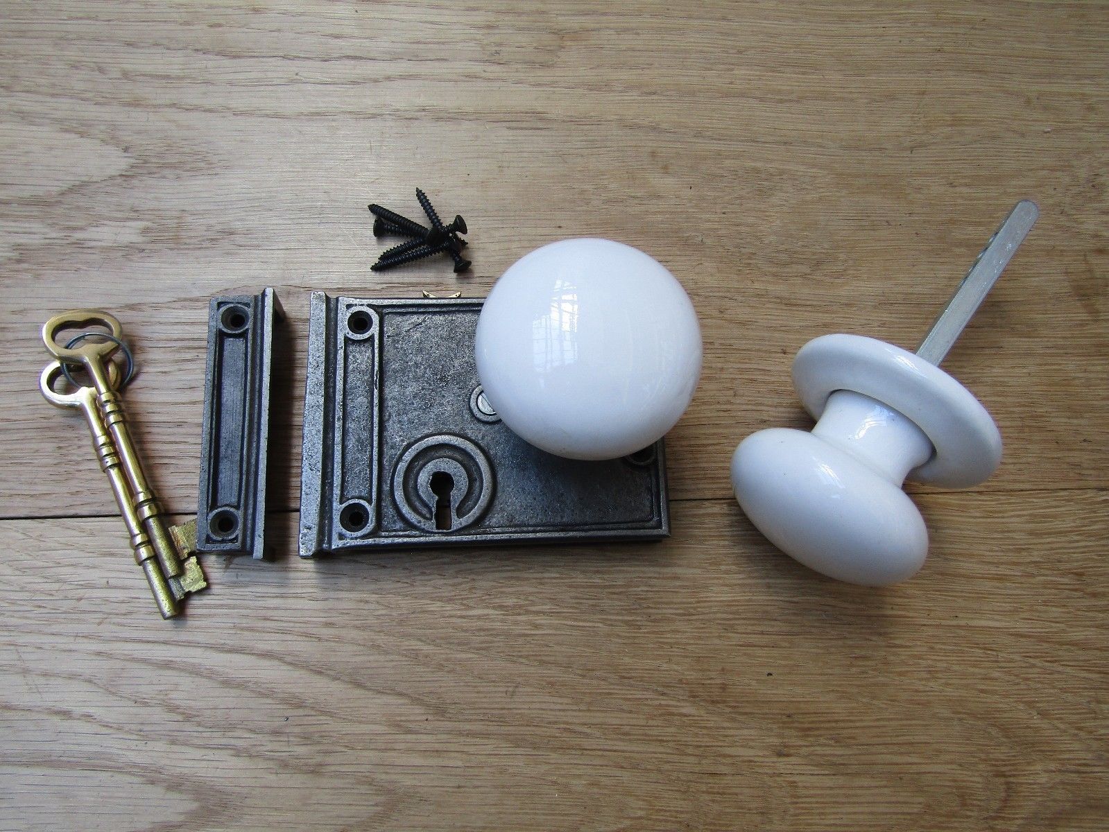 Horizontal Rim Lock Antique Iron & White Ceramic Set | Ironmongery World